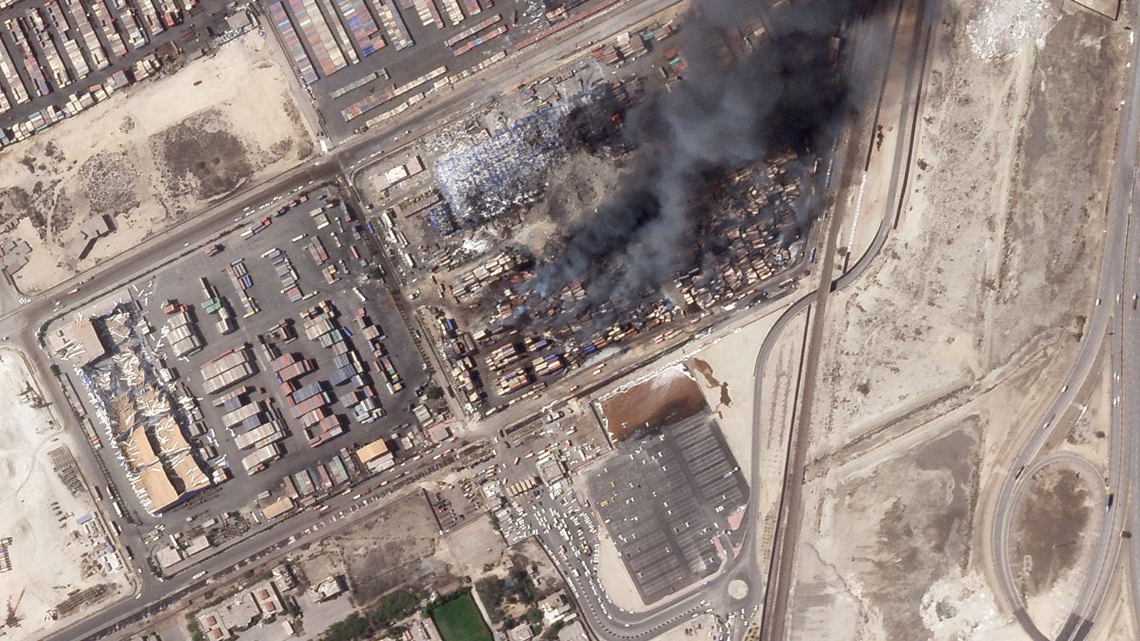 Iran says fire extinguished at a port rocked by explosion as the death ...