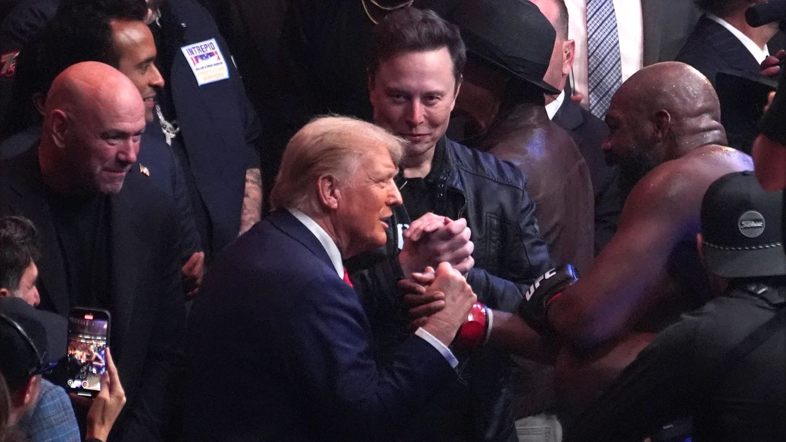 Trump receives standing ovation as he enters UFC event in Miami | News ...