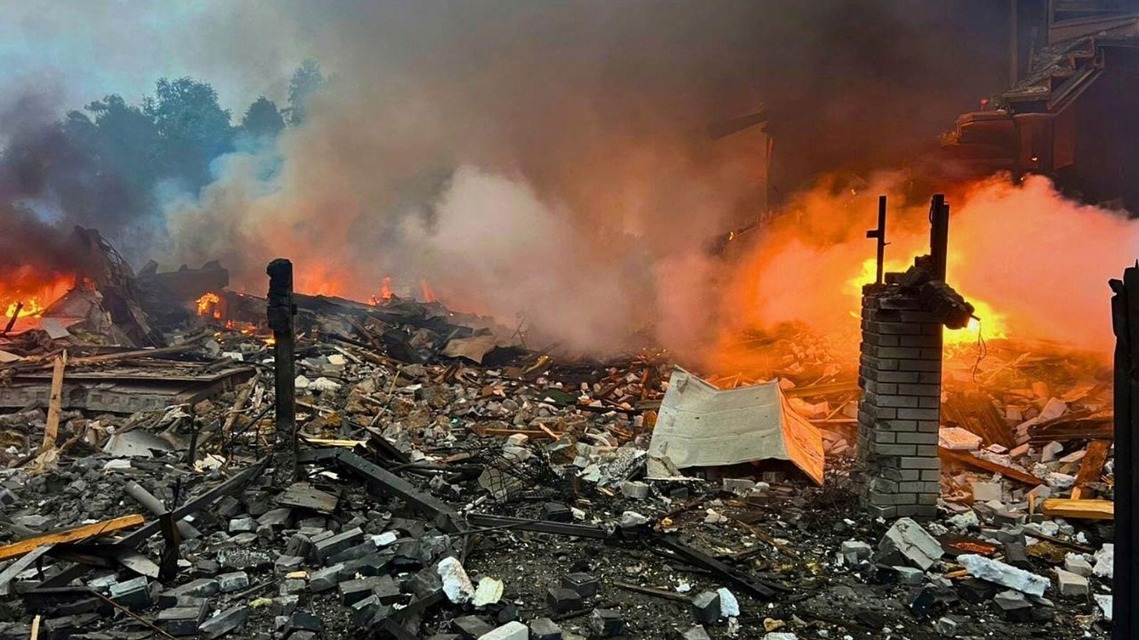 Death toll rises to 12 as massive air strikes hit Kyiv second night in ...