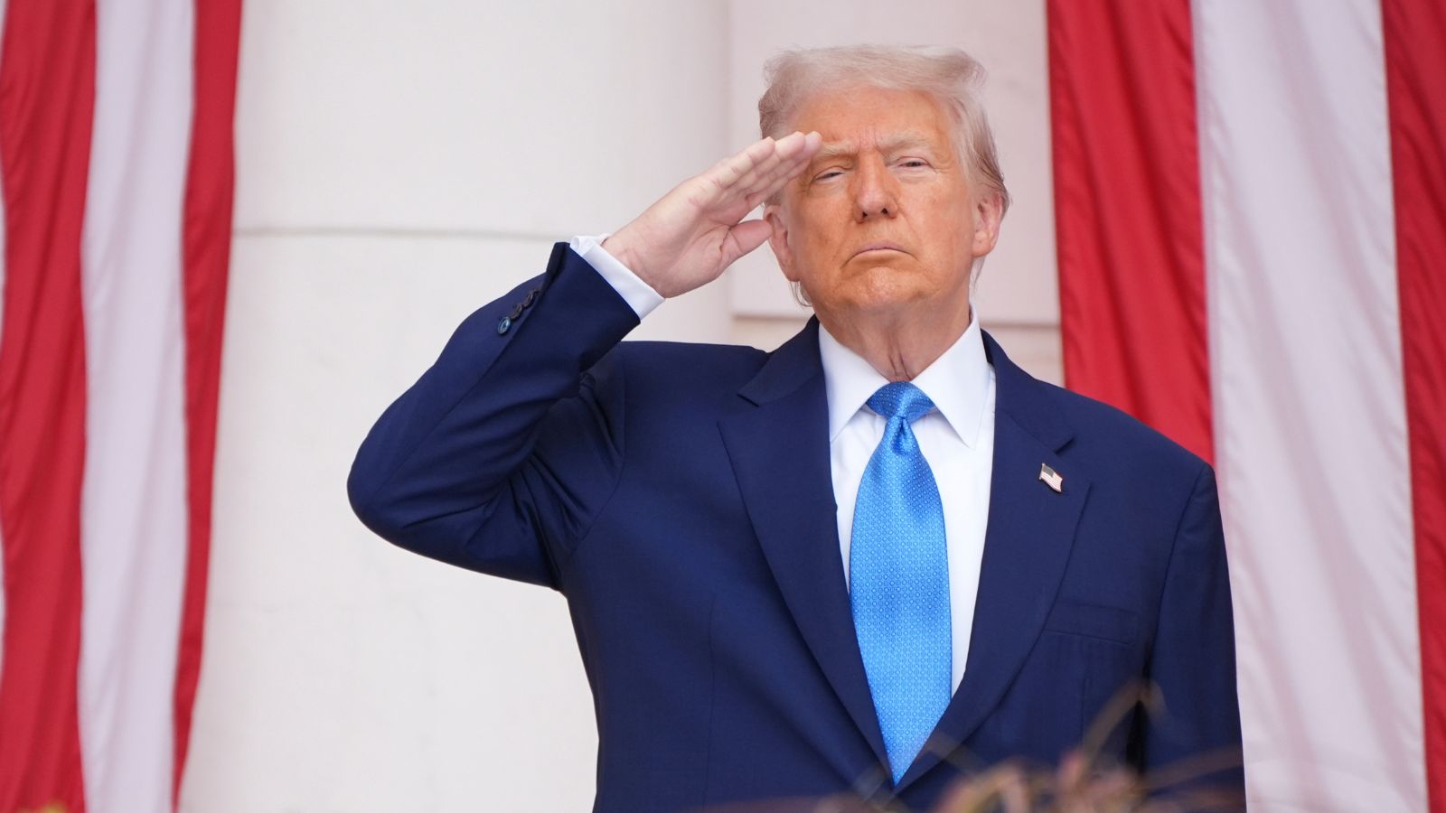 Trump pays tribute to fallen soldiers on Memorial Day with a hint of ...