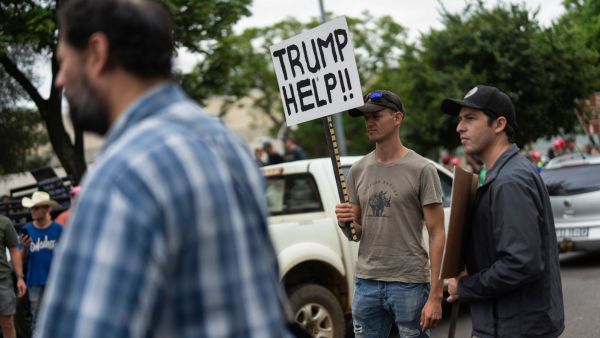 First White South Africans arrive in US as Trump claims they face ...