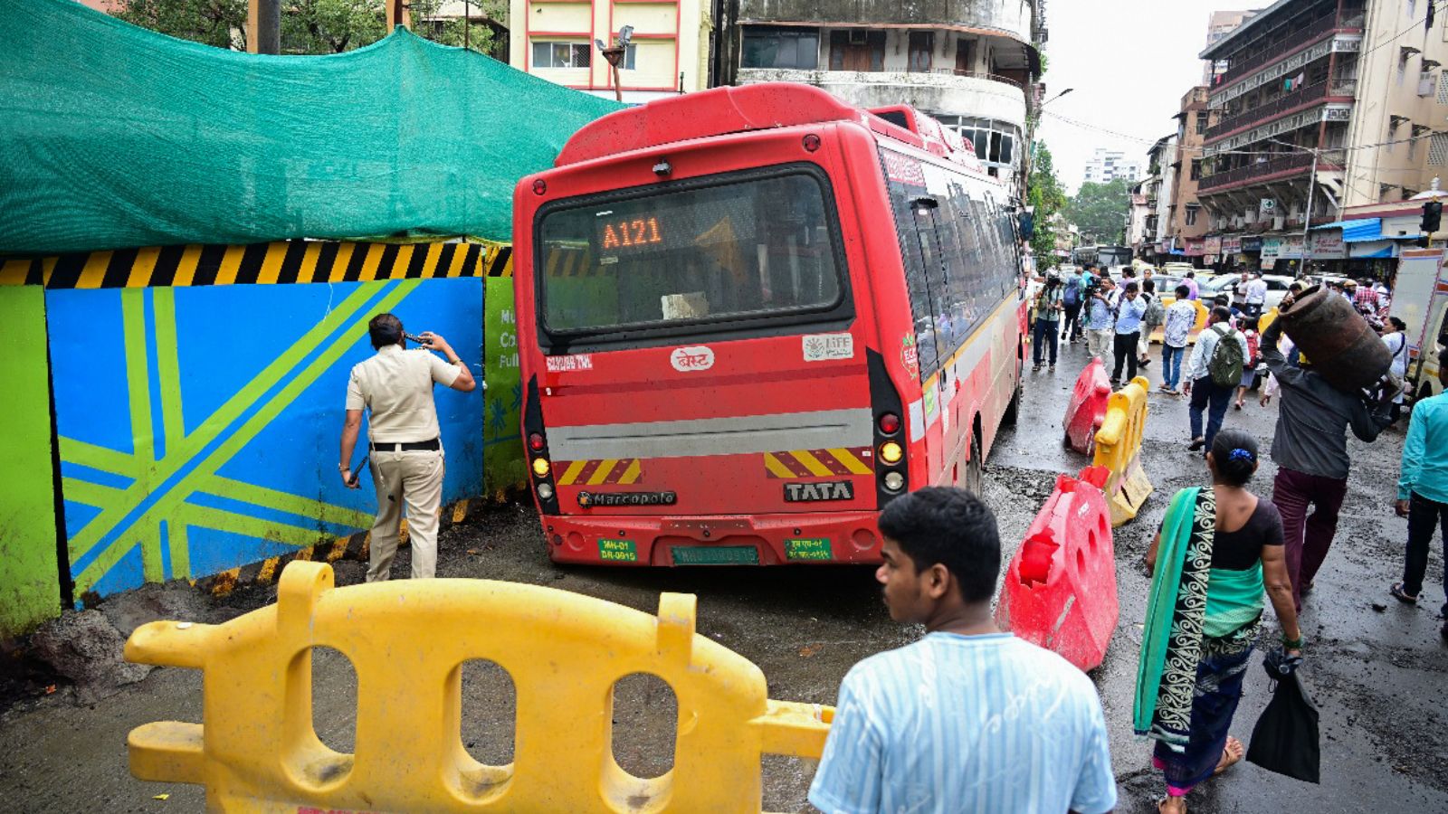 Bus gets stuck in road cave-in near Girgaon Metro site, none injured ...