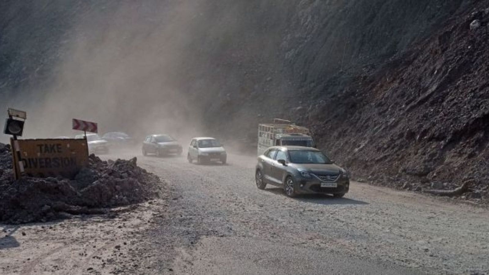 Traffic movement at landslide-prone Chakki Mod on Kalka-Shimla highway ...