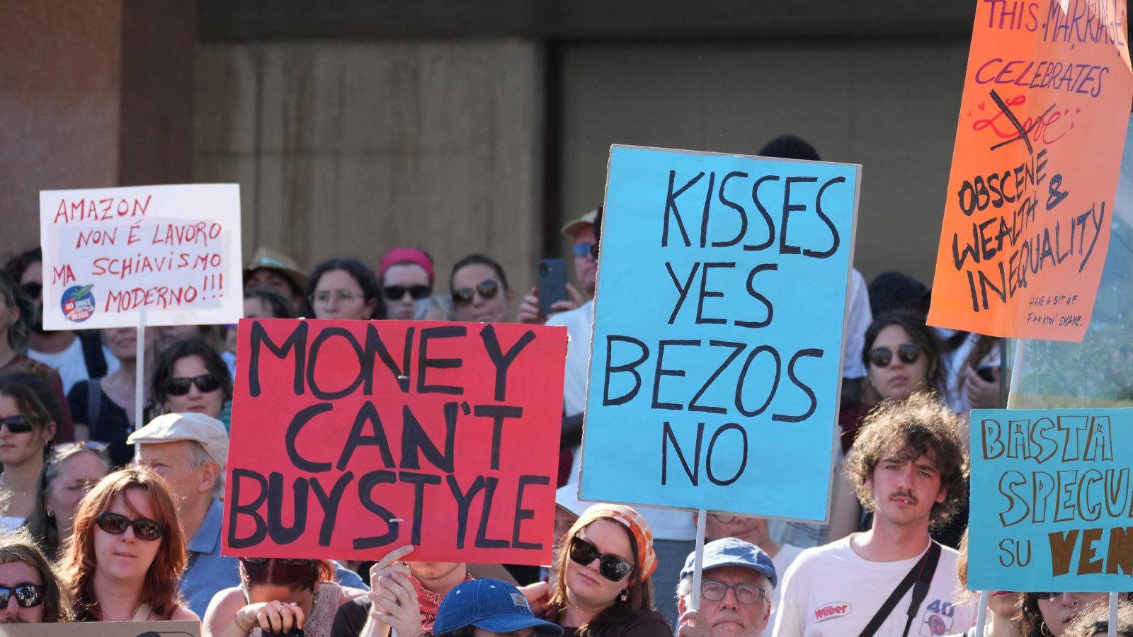‘Kisses yes, Bezos No,’ protesters say, as Amazon founder’s wedding ...