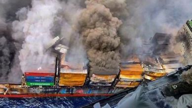 Singapore vessel on fire towed further out to sea as firefighting ...