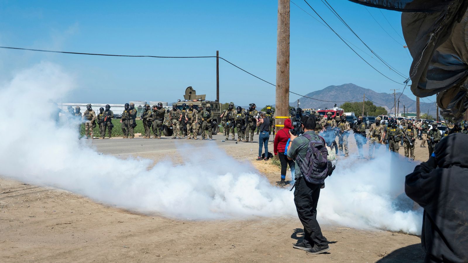 Protesters and federal agents clash during immigration raid at Southern ...