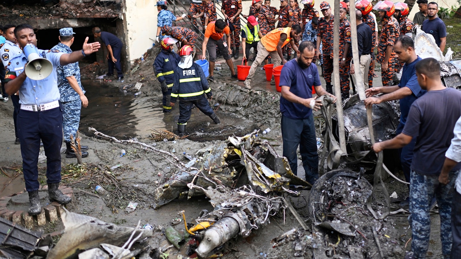 Bangladesh Air Force jet crash: death toll rises to 27, over 170 ...