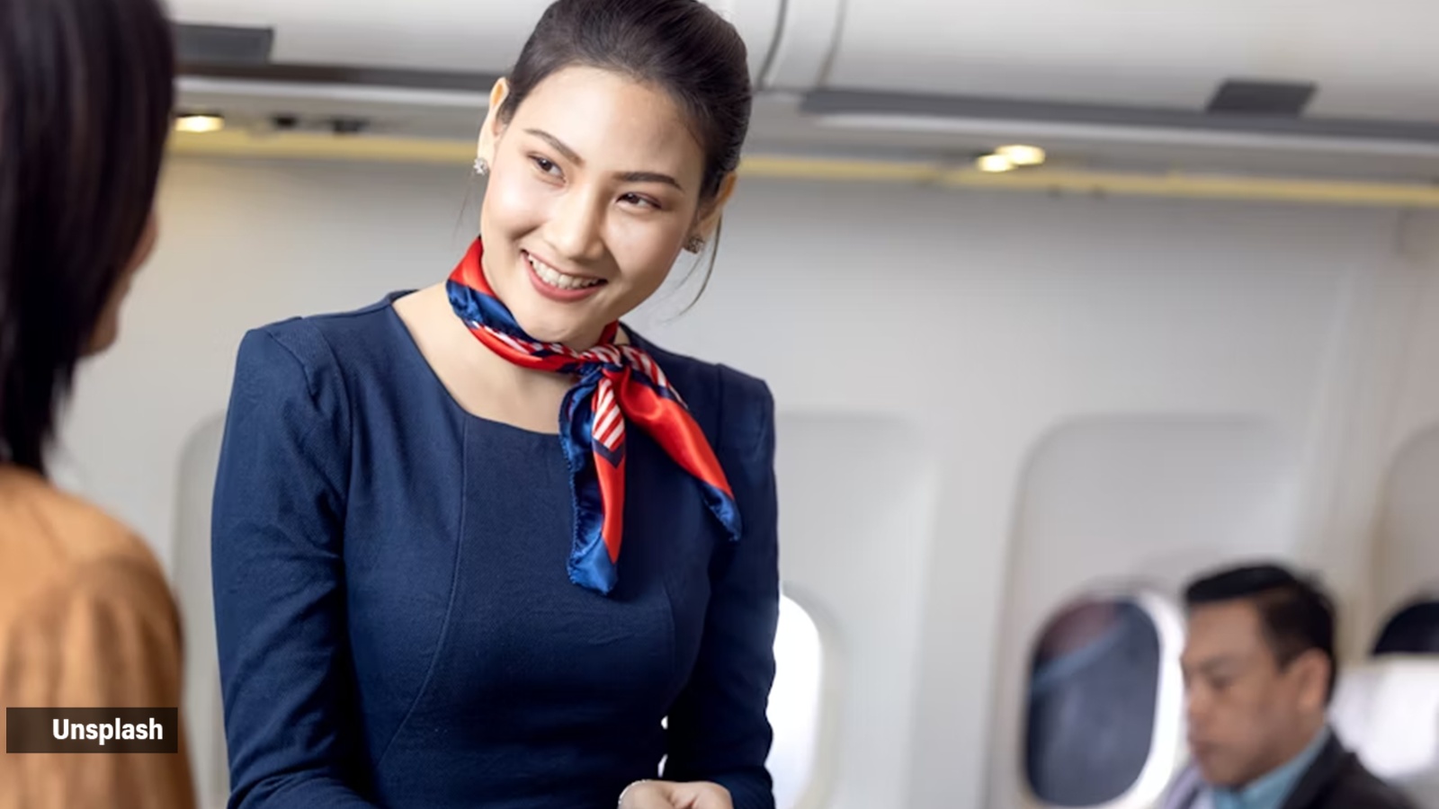 Why flight attendants greet you with a smile?