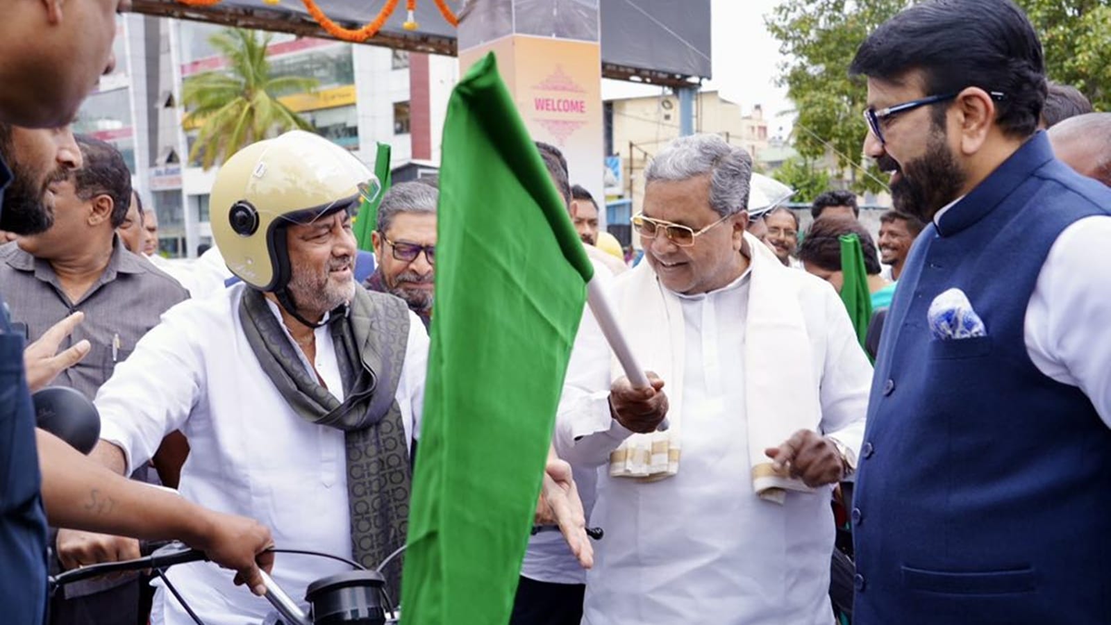Karnataka Deputy CM Shivakumar rides college-day bike on newly ...