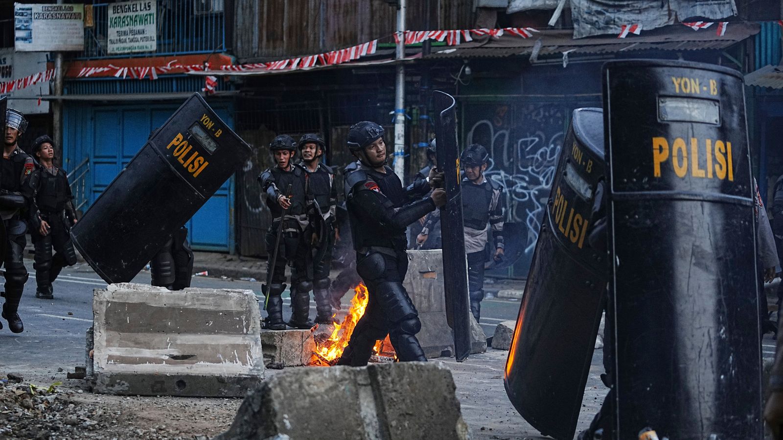 Riot police clash with students protesting lawmakers’ allowances in ...