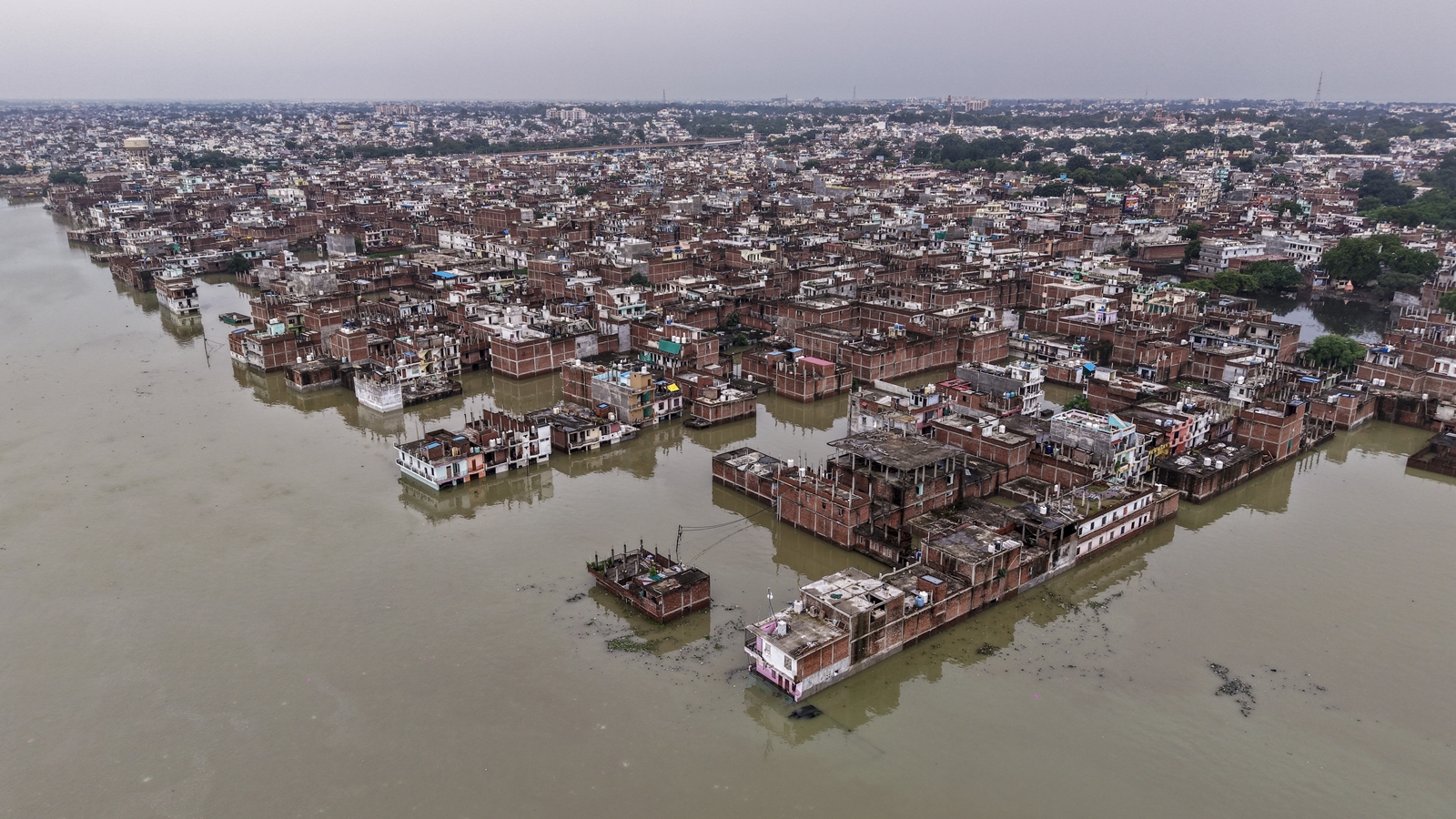 ‘Entire villages look like islands’: Floods ravage 24 districts in UP ...