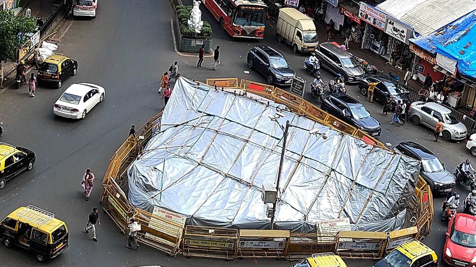 BMC covers up Dadar Kabutarkhana once again | Mumbai News - The Indian ...