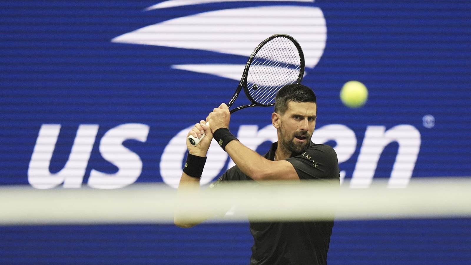 Novak Djokovic overcomes ailing American qualifier in US Open second ...