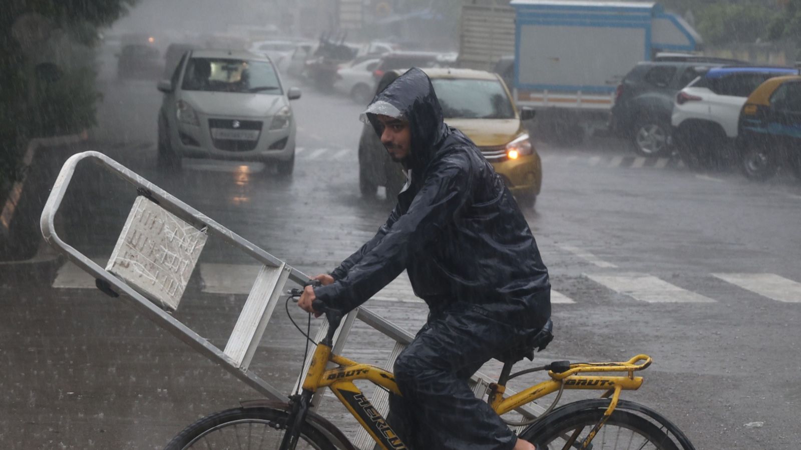 IMD issues red alert as heavy rain lashes Navi Mumbai, Raigad; Deputy ...