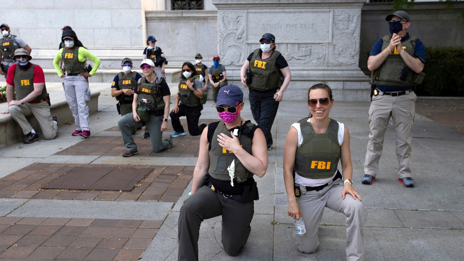 FBI fires agents who kneeled during 2020 racial justice protests over ...