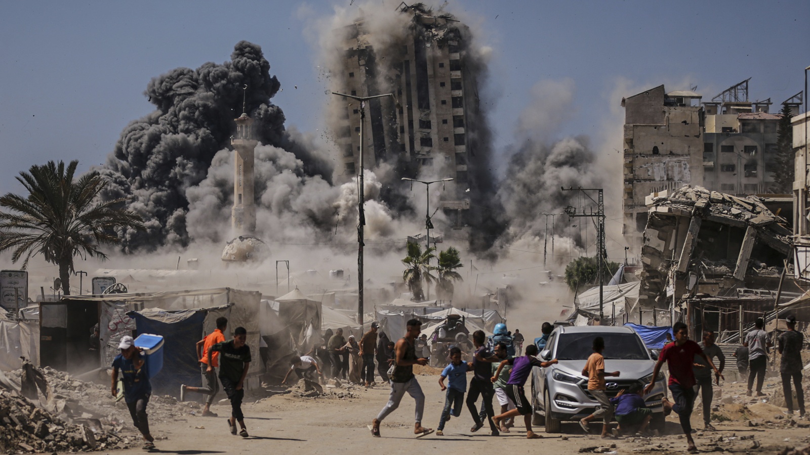 Israel destroys second high rise tower as IDF warns Gaza City residents ...