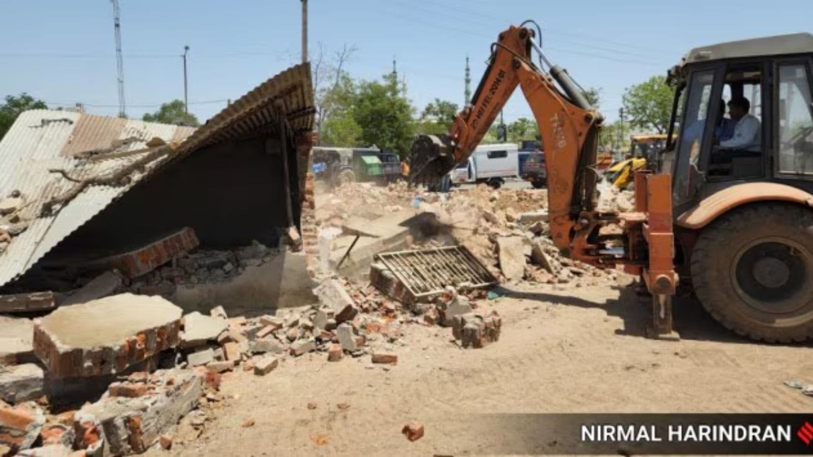 400 structures along Sabarmati banks in Gandhinagar razed as two-day demolition drive kicks off ...