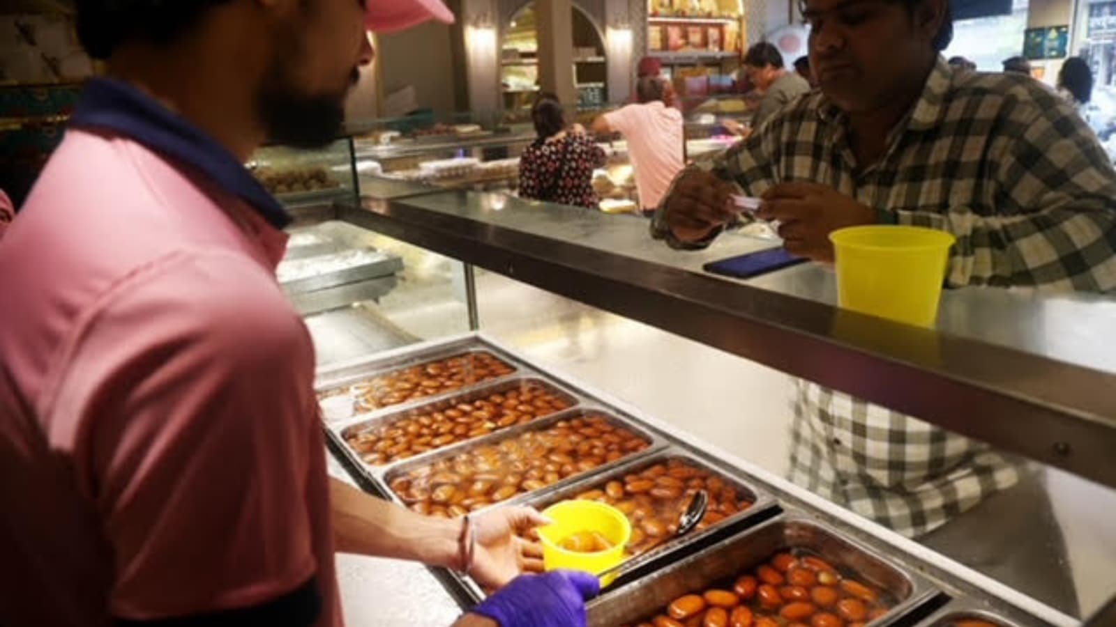 Around Town: Inside Jhama Sweets, the refugee stall that became ...