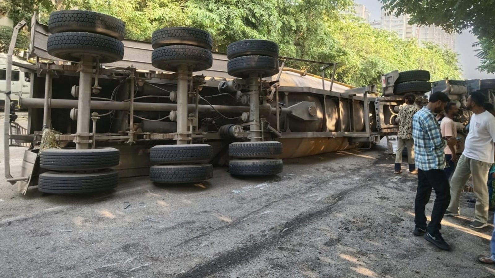 Truck overturns on Airport Road, hits traffic, no serious injuries ...