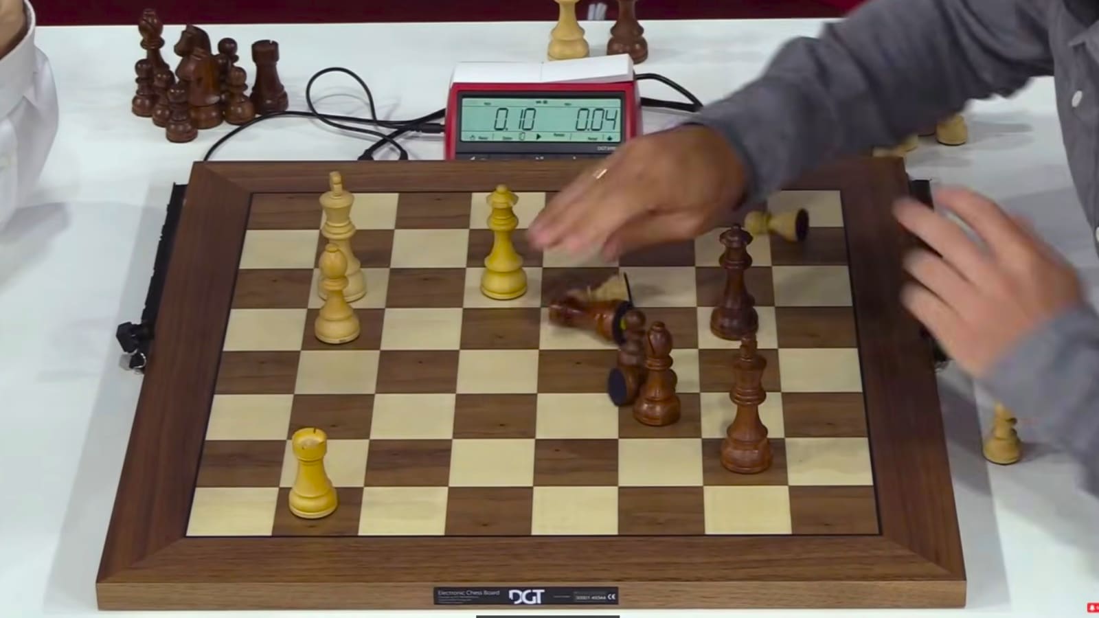 Magnus Carlsen loses by forfeit after another accident with pieces at ...