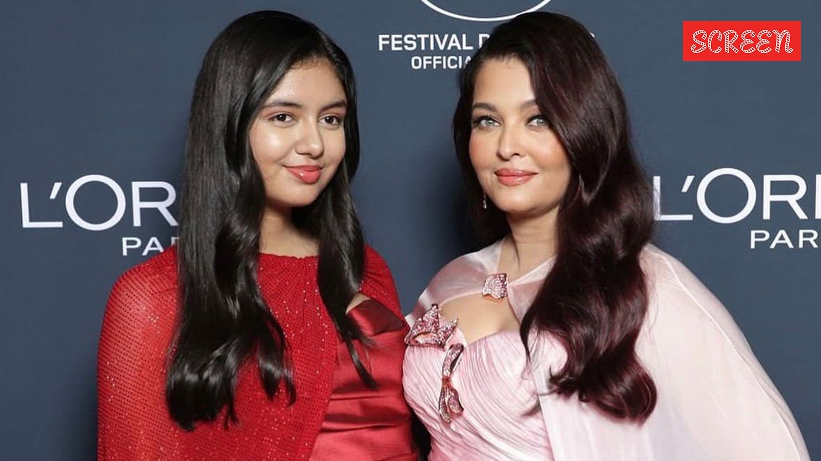 Aishwarya Rai Bachchan’s daughter Aaradhya poses for photographers in a ...