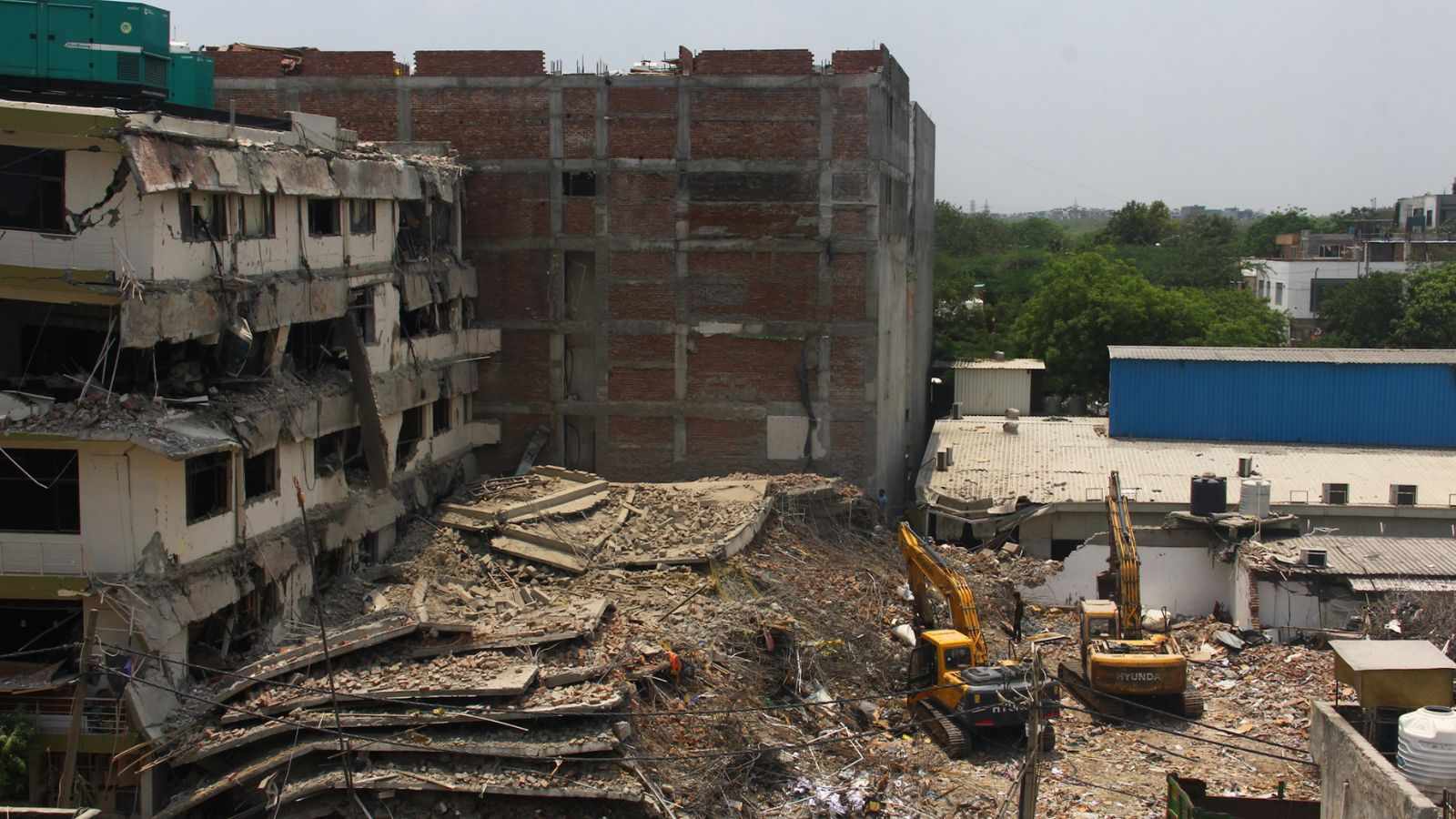 Building collapse near Saket Metro station: Contractor hid in Dehradun ...