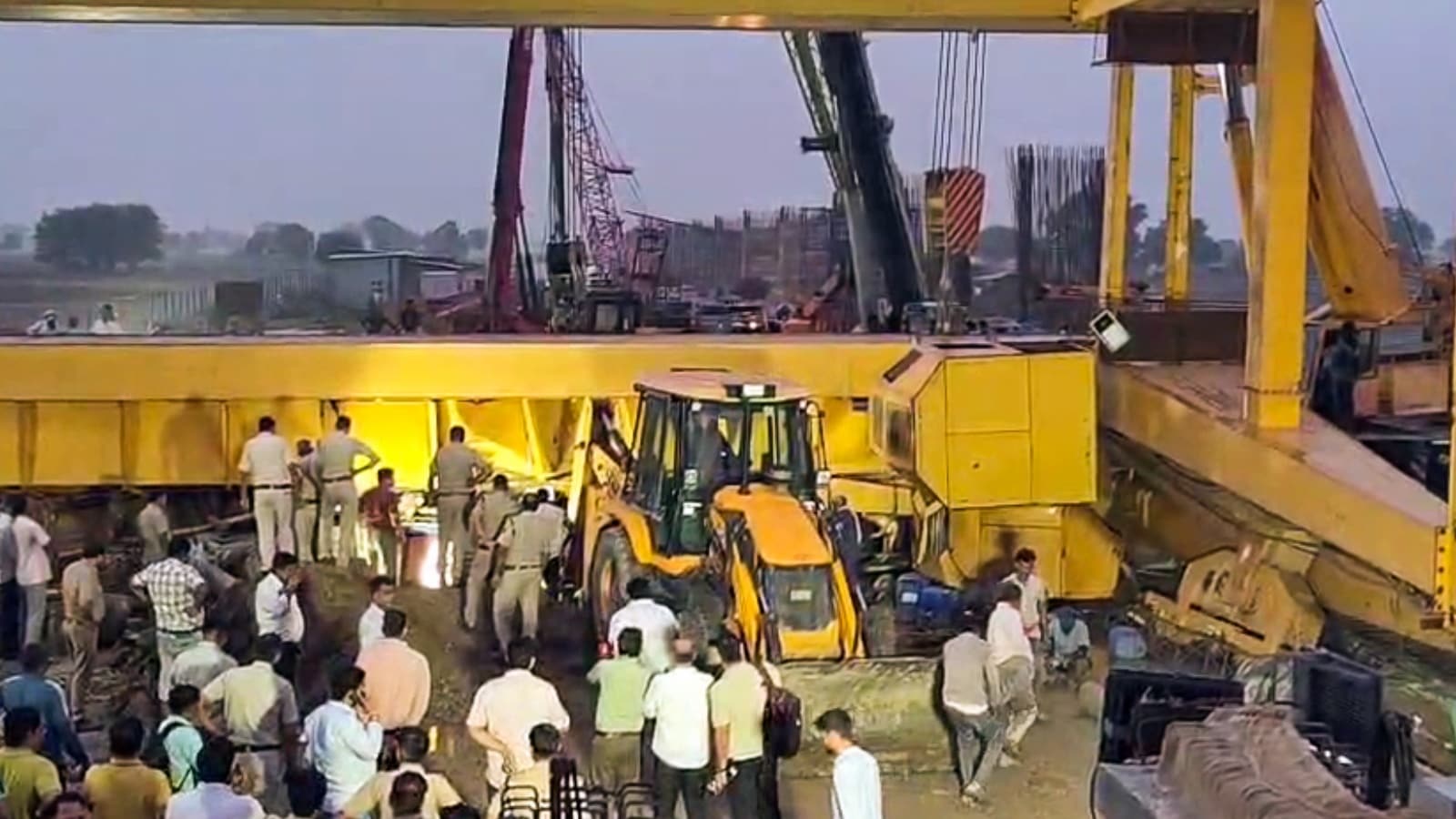 3 killed as crane overturns on under construction flyover linking Noida ...